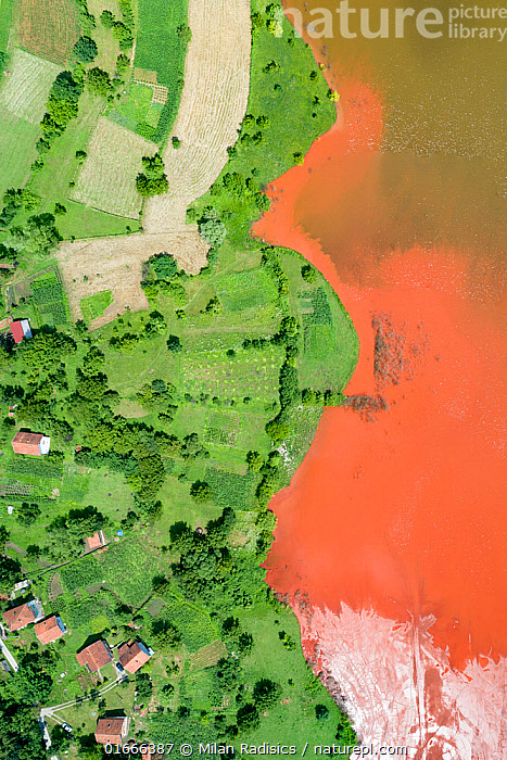 Stock photo of Aerial view of red mud deposits in storage pond. A ...