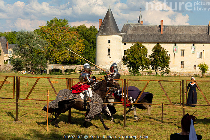 Stock photo of Two men in medieval knight costume on horseback, in ...