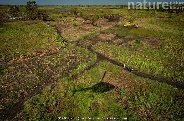 Stock photo of Aerial view of helicopters landing at Mapanda community ...