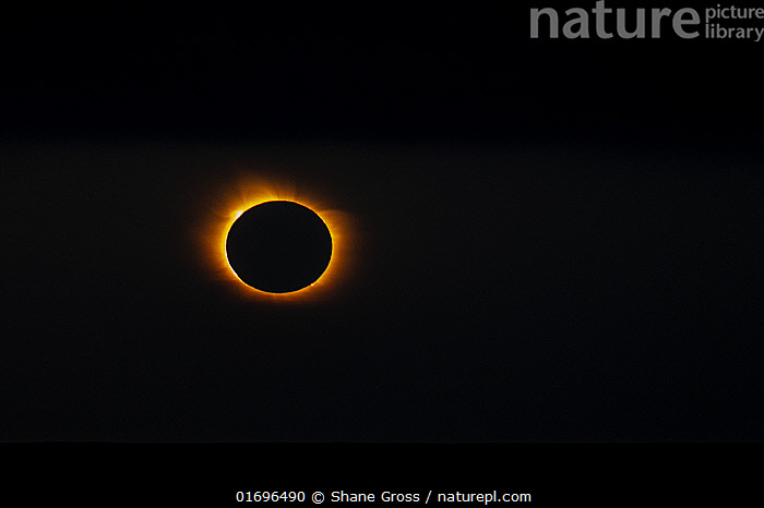 Stock photo of A total solar eclipse over the Southern ocean between ...