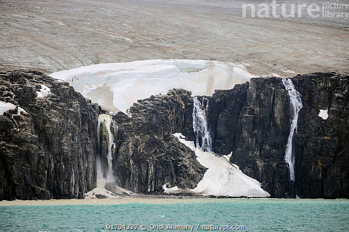 Stock photo of Waterfalls of meltwater cascading into the sea due to ...