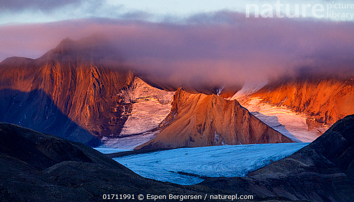 Stock photo of Landscape of Kongsfjorden with low hanging clouds ...