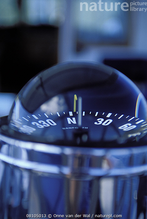 Stock photo of Close up of sailing boat's compass looking North ...