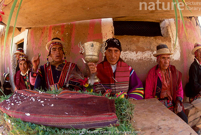 Stock photo of Quechua men with silver cup at traditional wedding ...