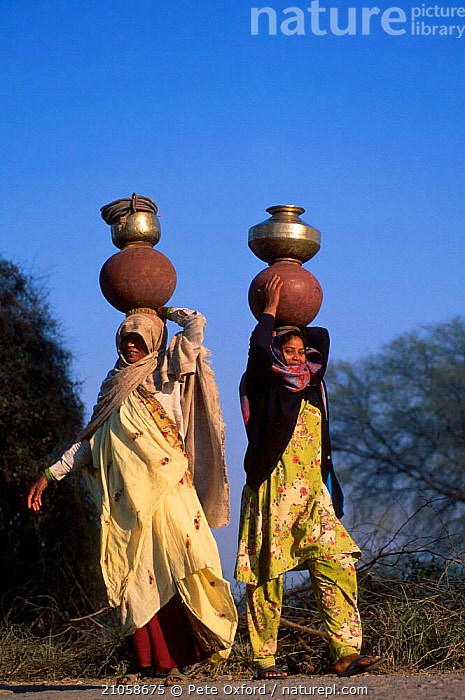 Stock photo of Women balancing water pots on their heads Delhi India ...