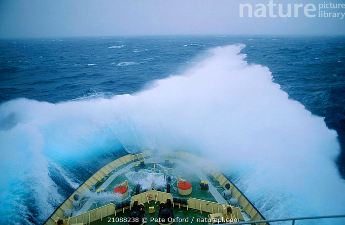 Stock photo of Waves break over bow in rough seas S Indian Ocean ...